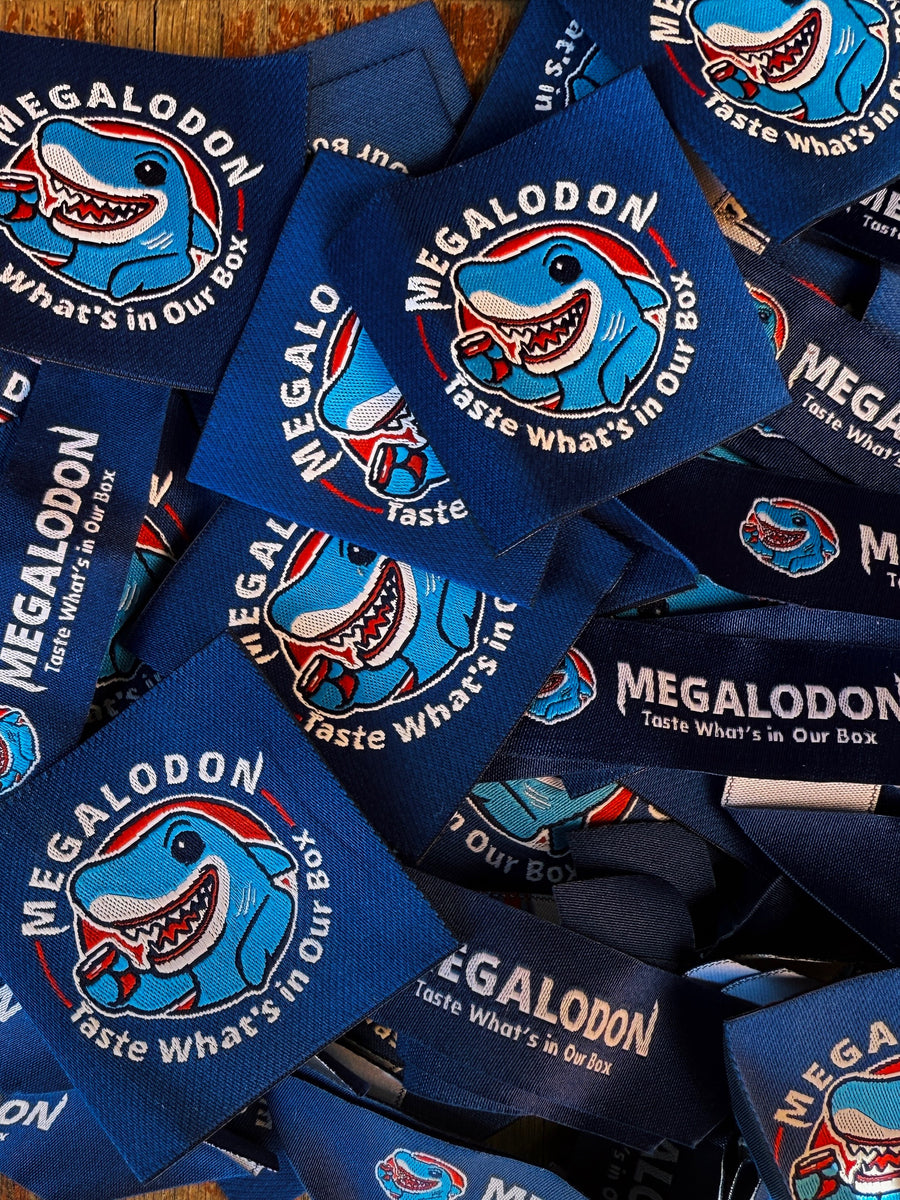 Megalodon Logo White T-Shirt | Beach Party Tee | Official Brand Apparel ...